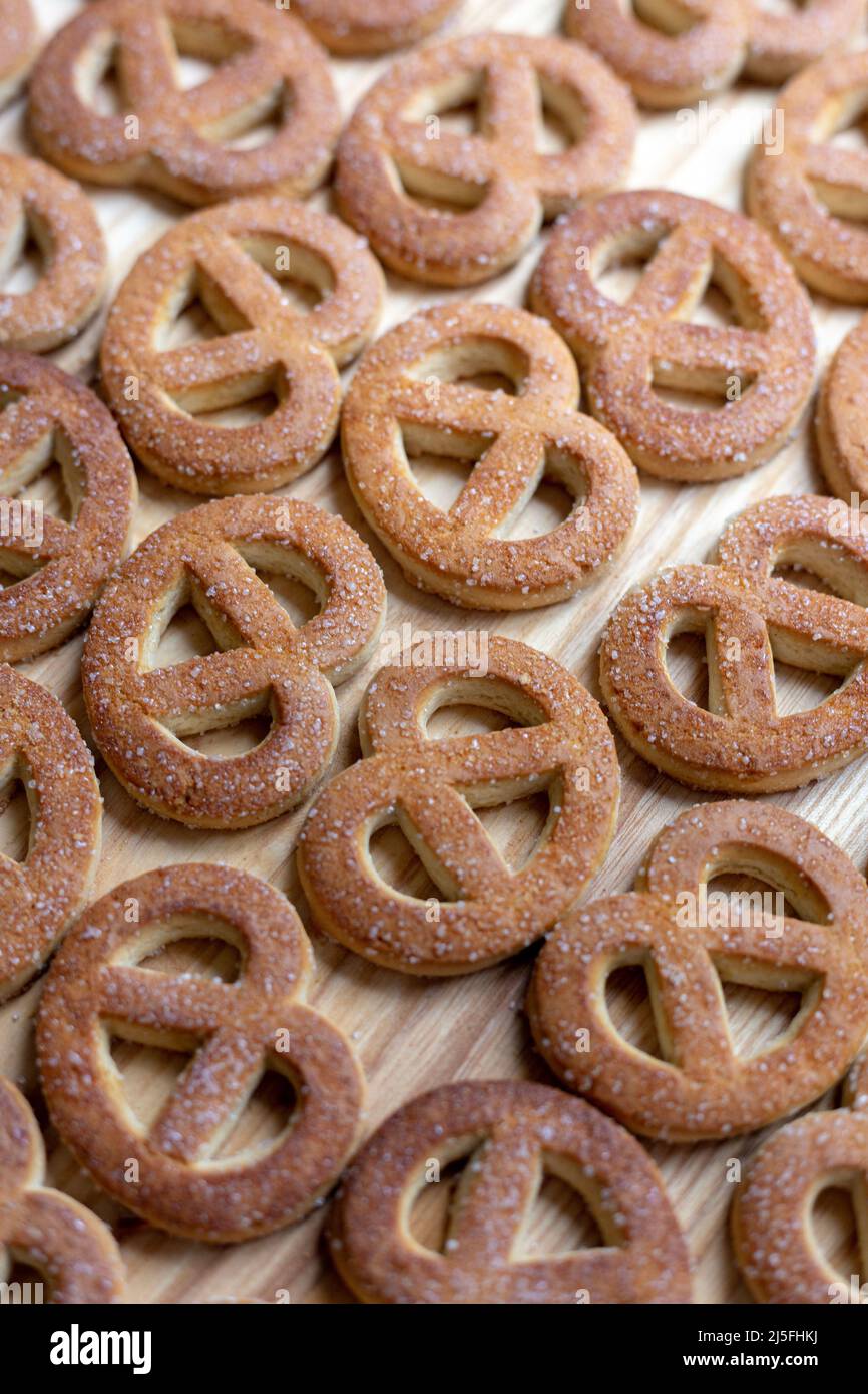 Baking on a wooden tabletop. Flour sweets Stock Photo - Alamy