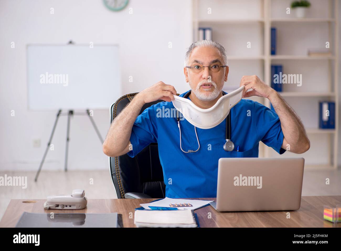 Old man neck brace hi-res stock photography and images - Alamy