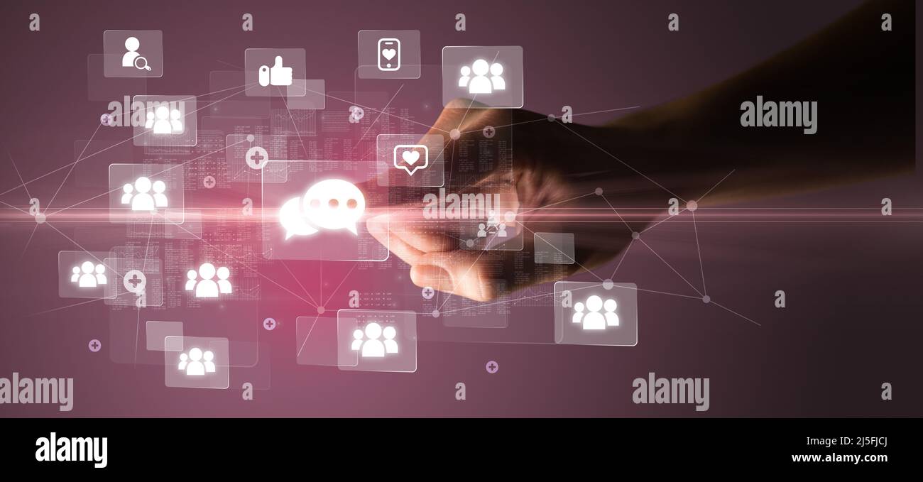 Hand pressing social media multimedia application screen with media ...