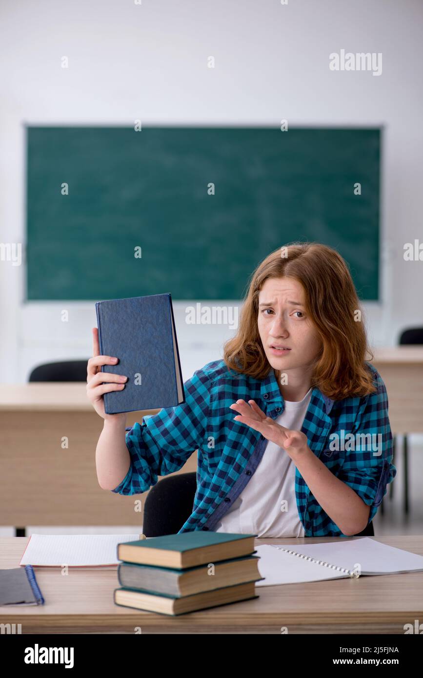 Female student preparing for exams in the classroom Stock Photo - Alamy