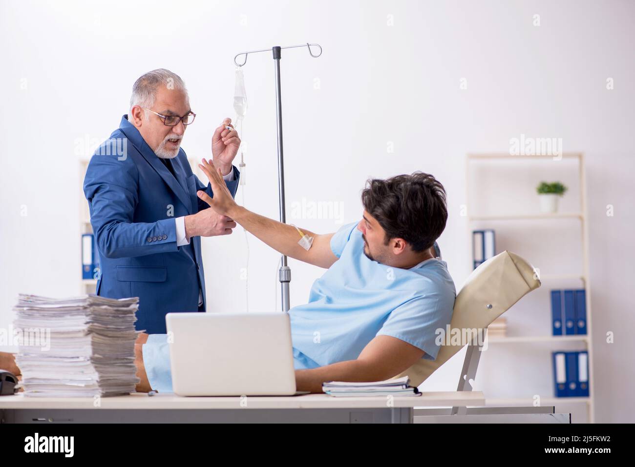Young employee feeling bad at workplace Stock Photo - Alamy