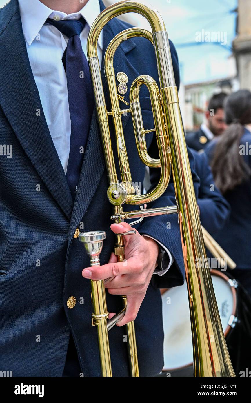 Man's hands playing the trombone in the orchestra Stock Photo - Alamy