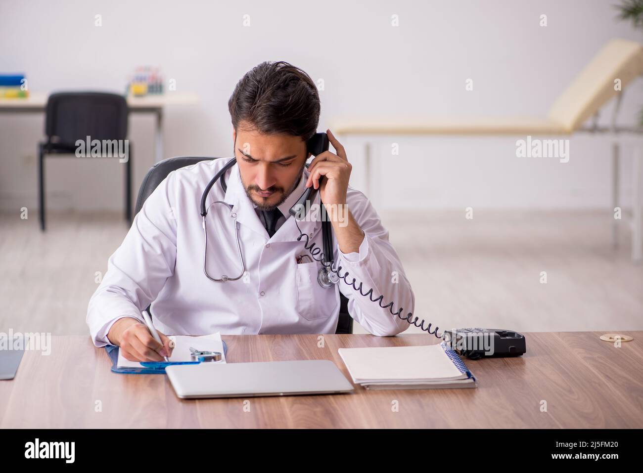 Doctor taking notes telehealth hi-res stock photography and images - Alamy