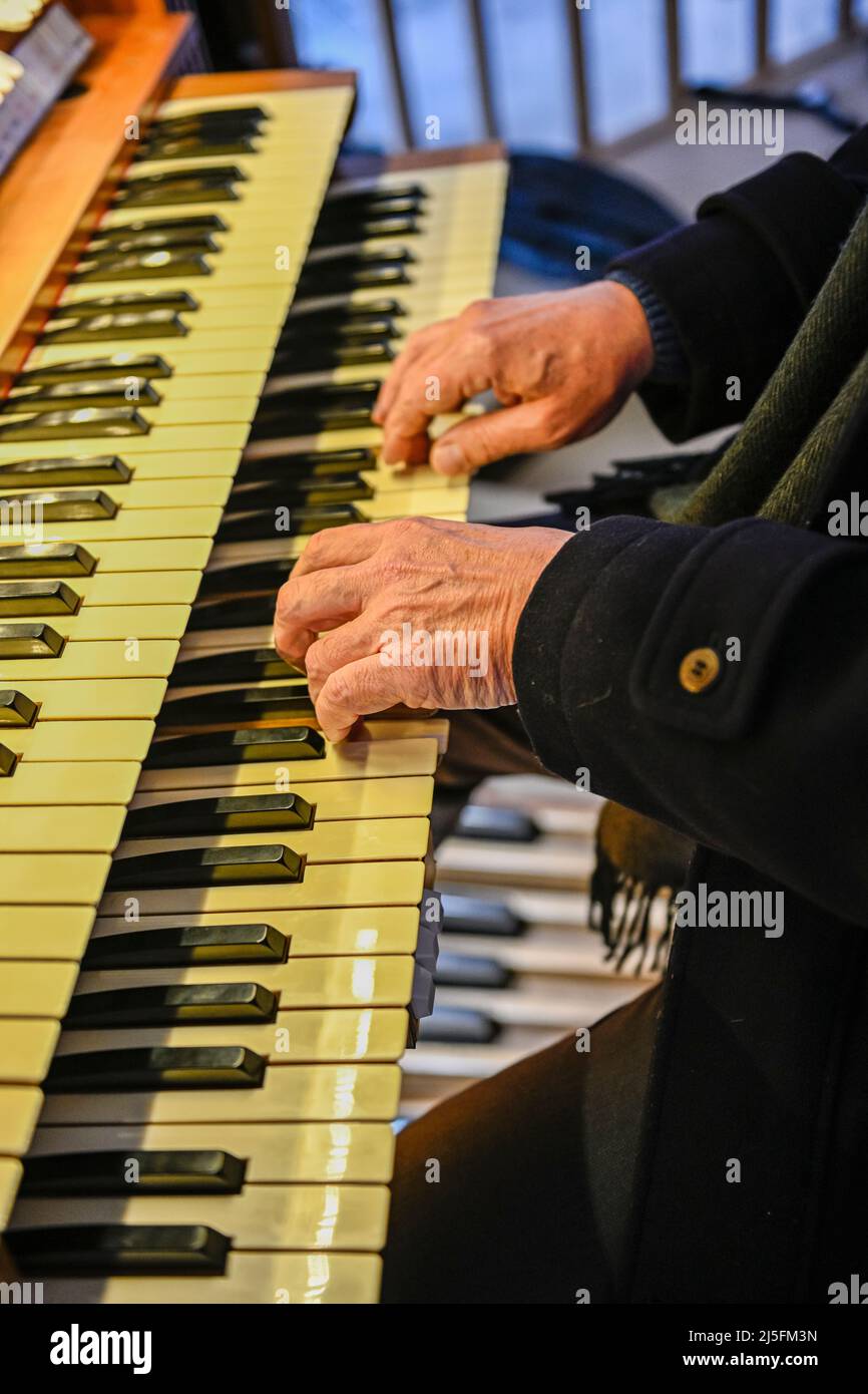 Hands playing instruments hi-res stock photography and images - Alamy