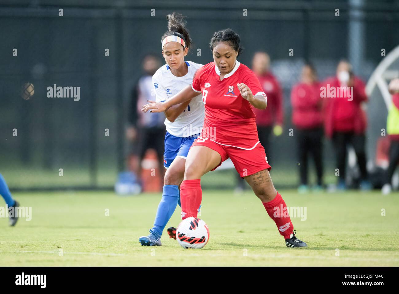 Fololeni Siale (R) of the Tonga Women's Soccer Team seen in action ...