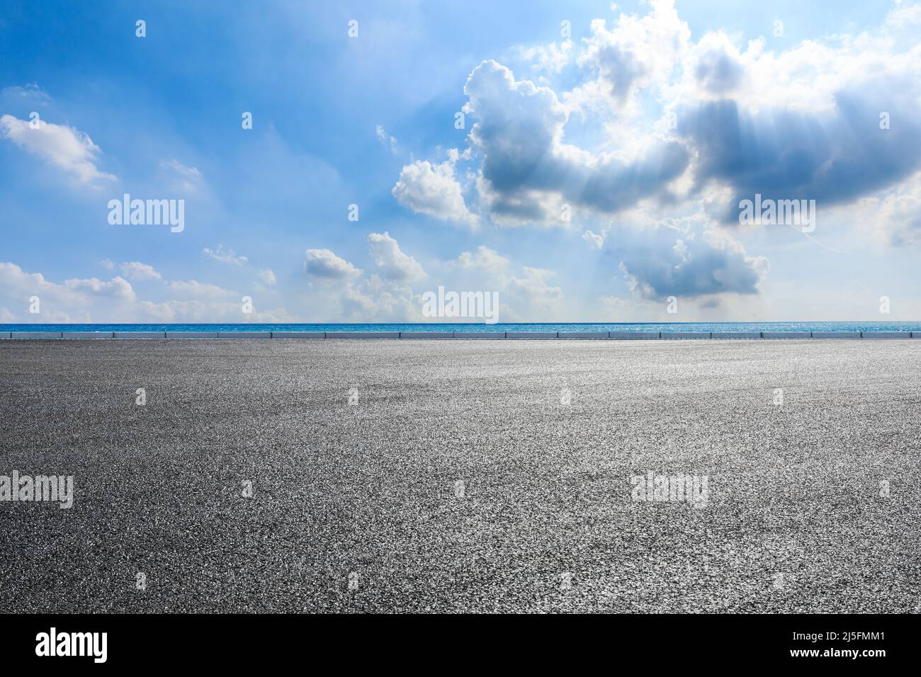 Empty asphalt road near sea hi-res stock photography and images - Alamy