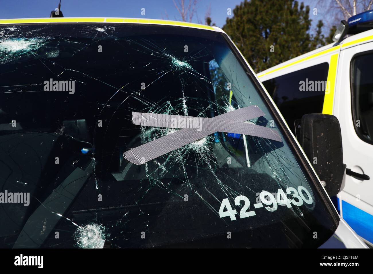 Destroyed police car after the stone-throwing this weekend during the ...