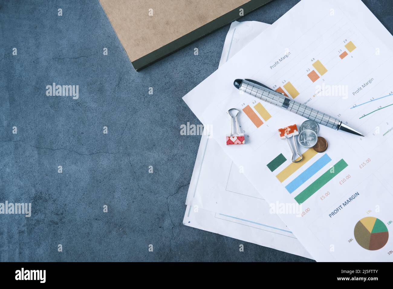 financial graph, calculator and notepad on table with copy space Stock ...