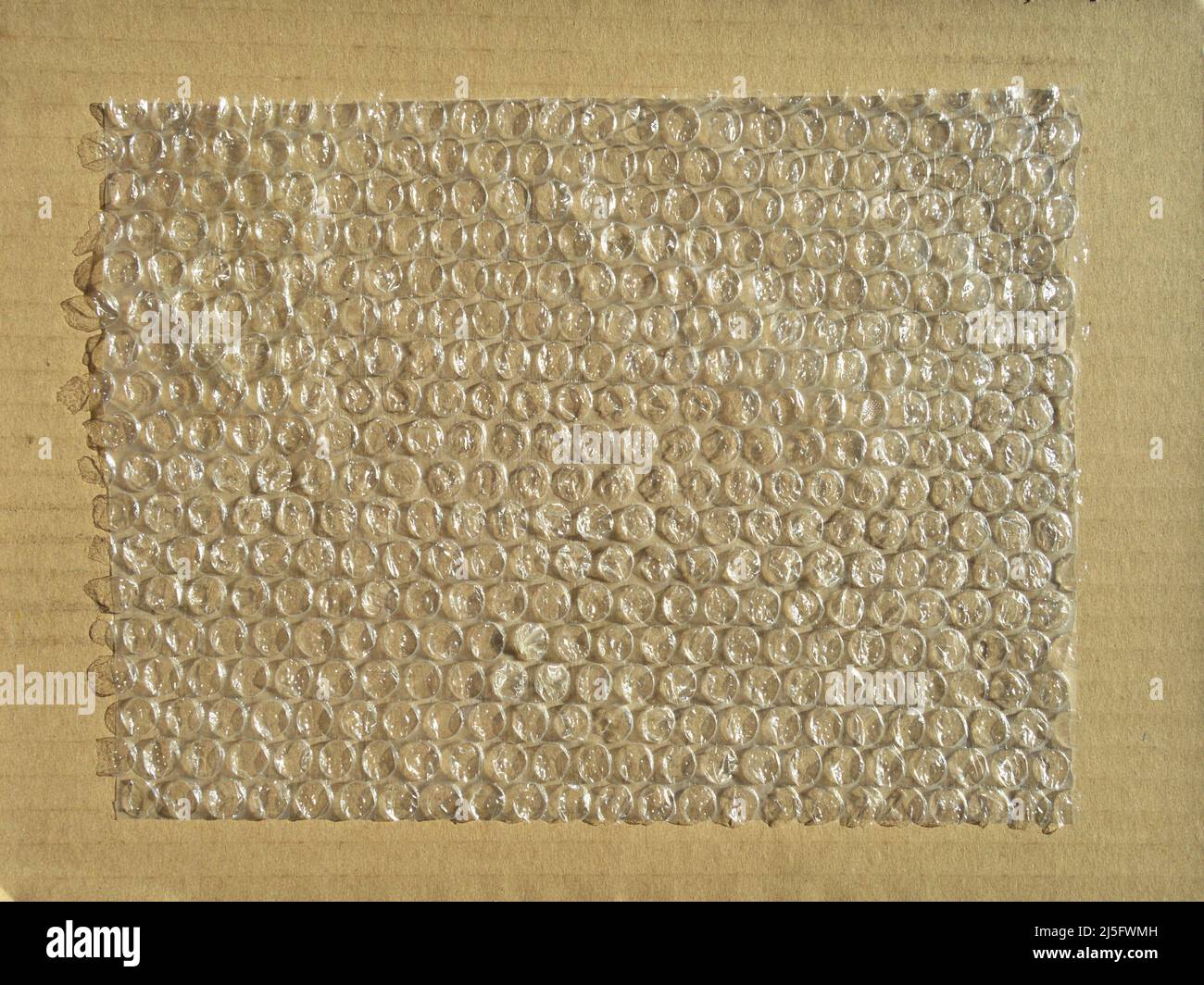 On corrugated cardboard paper plastic air bubble protection foil wrap ...