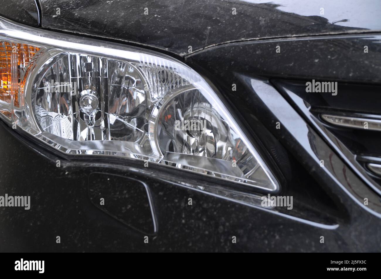 Detail of car headlights lamp, black modern a luxury car front lamp ...