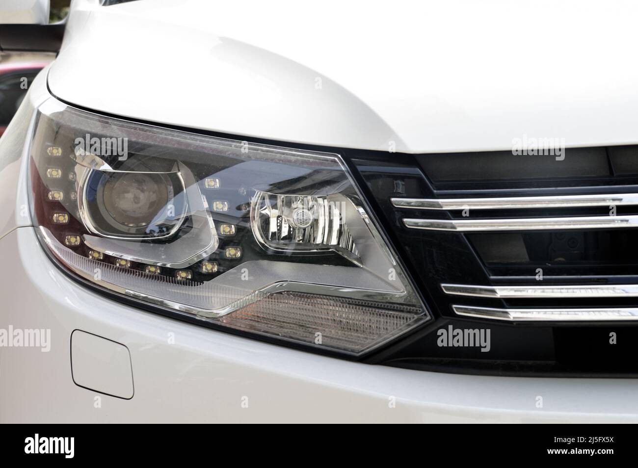 Detail of car headlights lamp, white modern a luxury car front lamp ...
