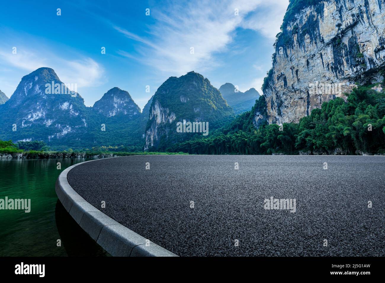 Asphalt road platform and mountain natural scenery under blue sky in ...