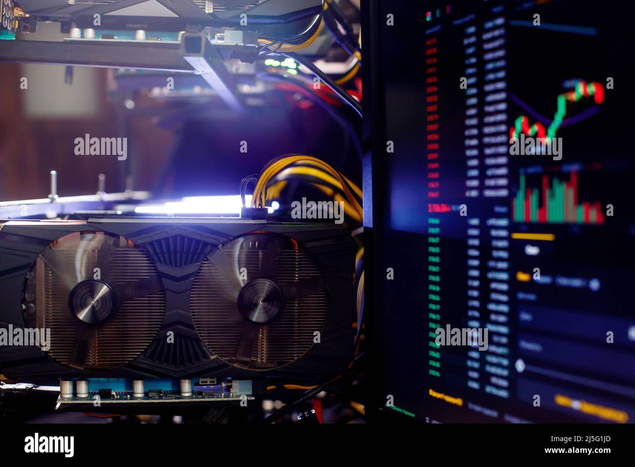 Graphics cards in rig for ethereum mining farm on background Stock ...