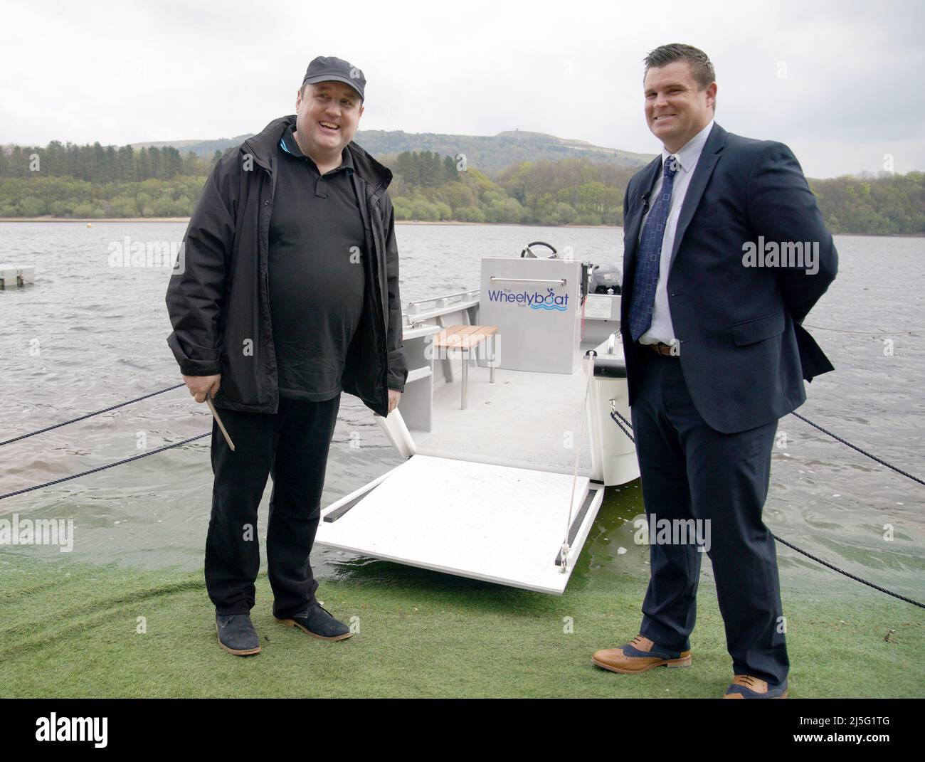 Comedian Peter Kay (left), stands with David Germain, CEO of the ...