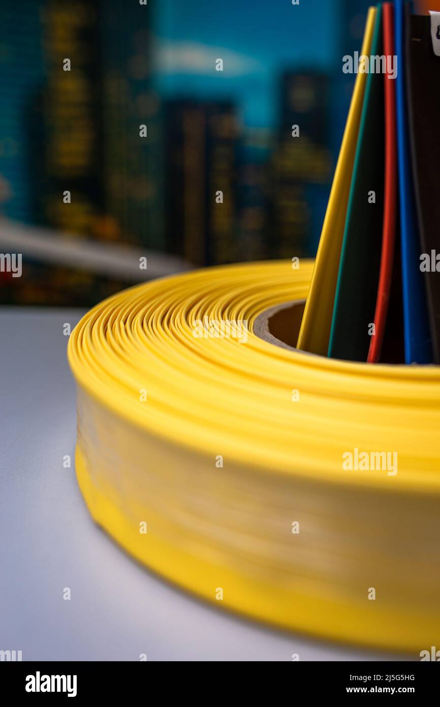 yellow rubber insulation for electrical wires in a roll Stock Photo - Alamy
