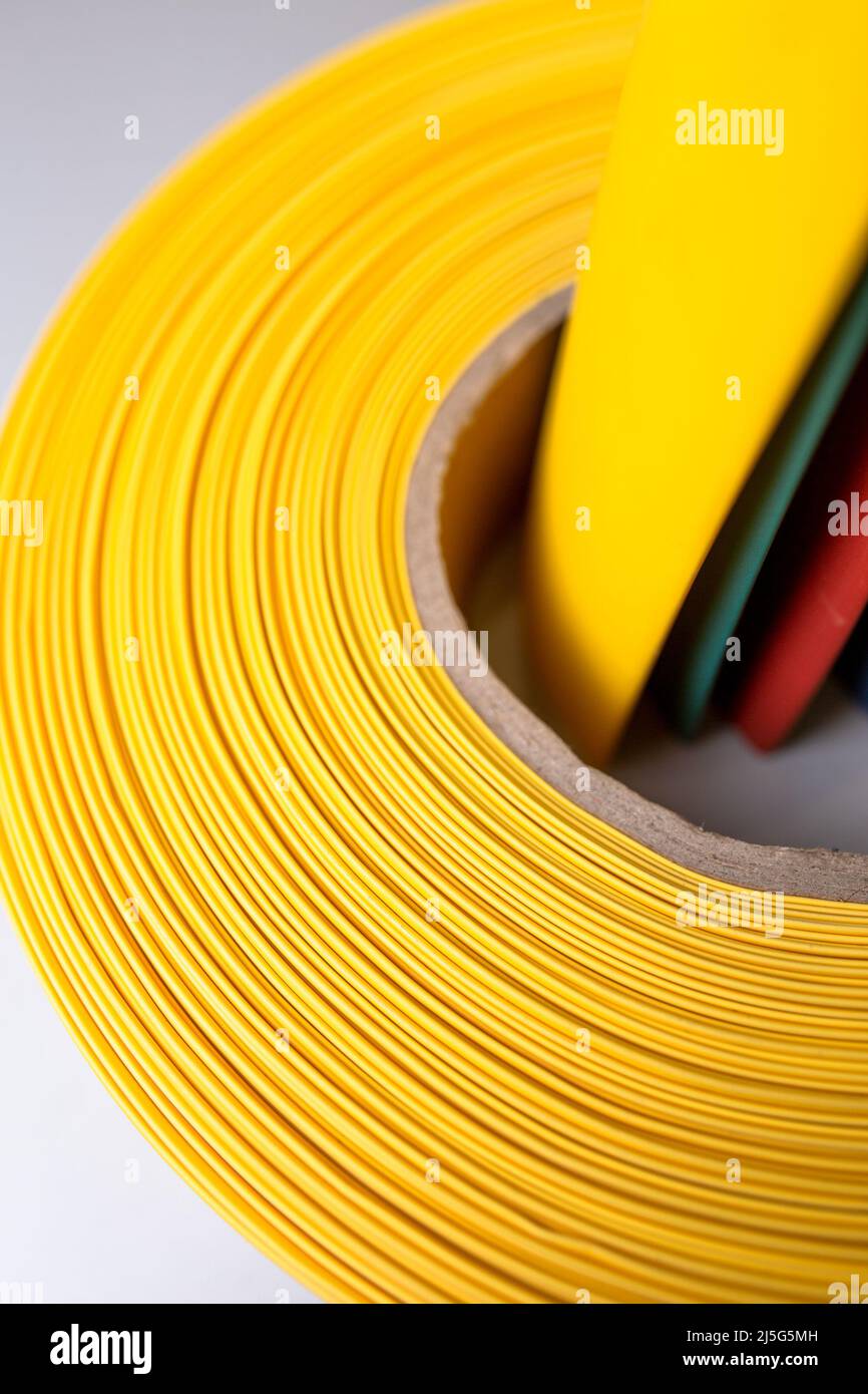 yellow rubber insulation for electrical wires in a roll Stock Photo - Alamy