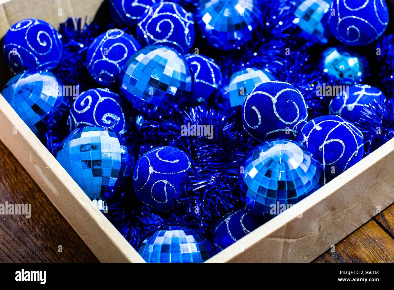 Christmas decorations in a box. Christmas concept. Box with blue ...