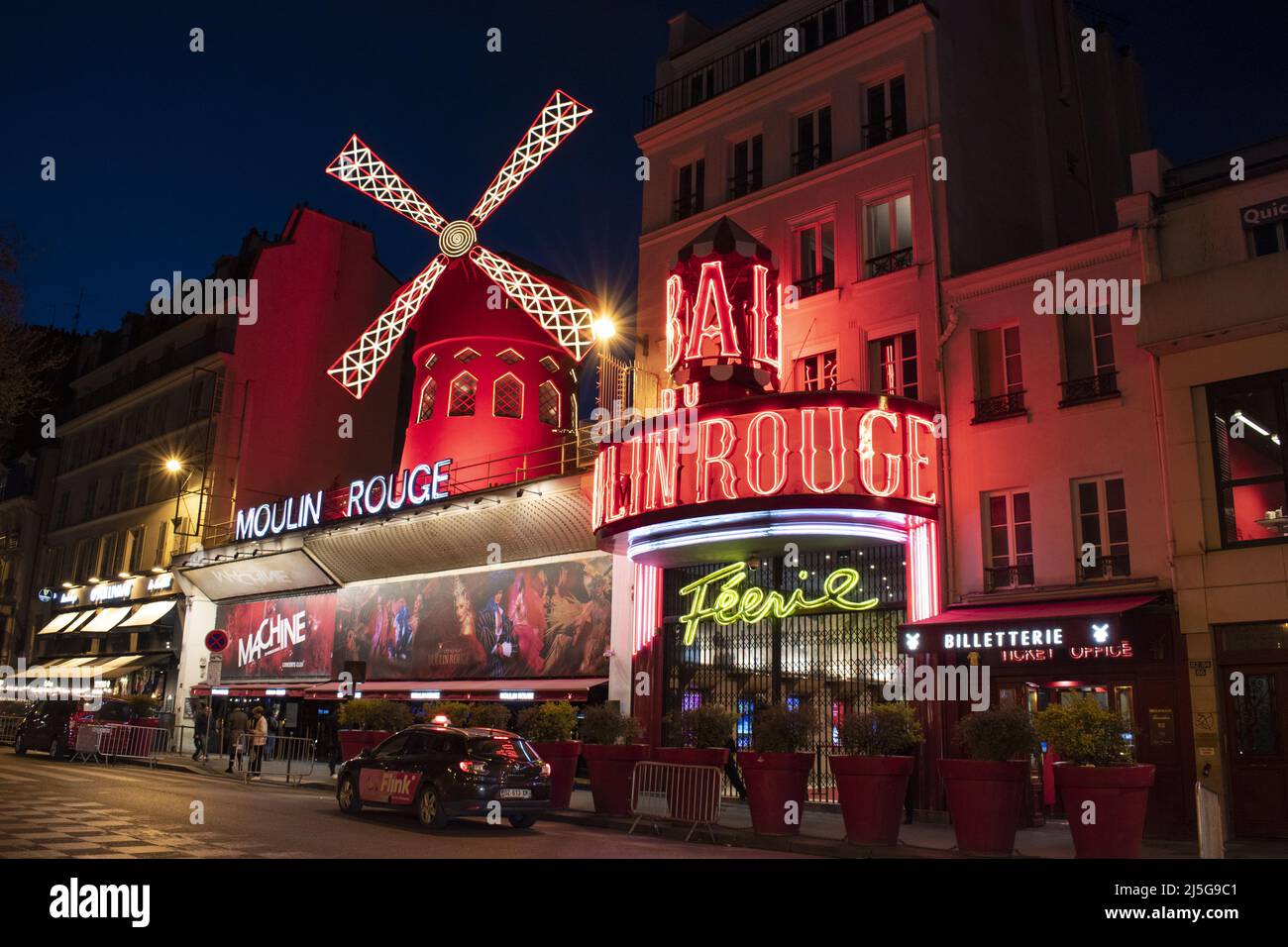 Paris: neon signs and exteriors of Moulin Rouge, one of the most famous ...