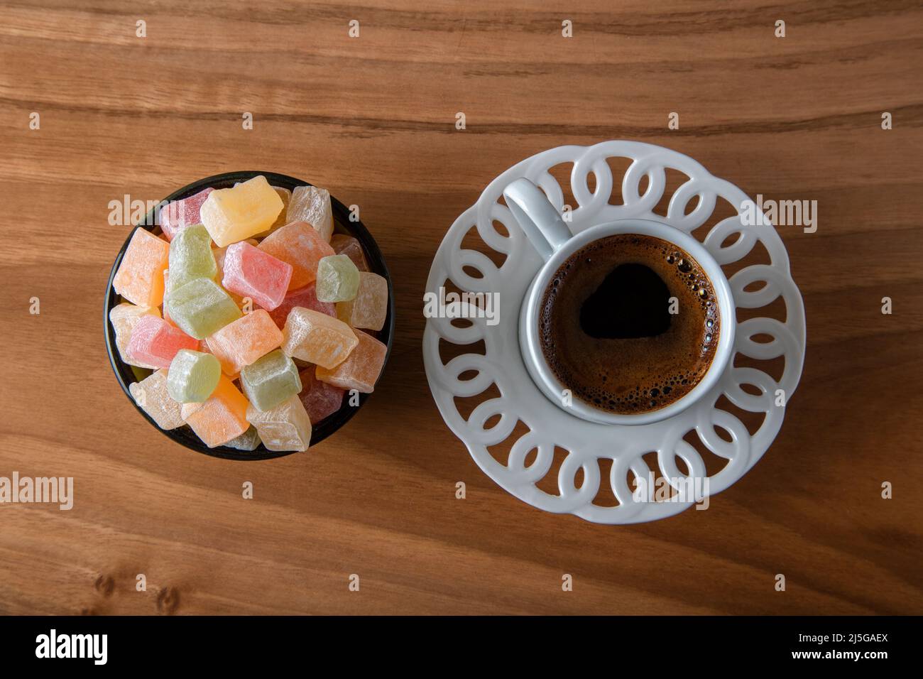 Traditional Turkish delight and Turkish coffee on a wooden background ...