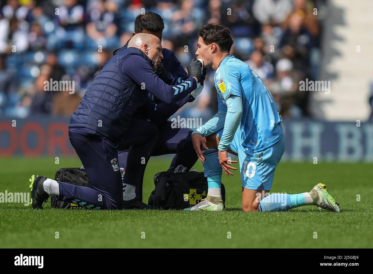 Callum O'Hare #10 of Coventry City receives medical treatment Stock ...