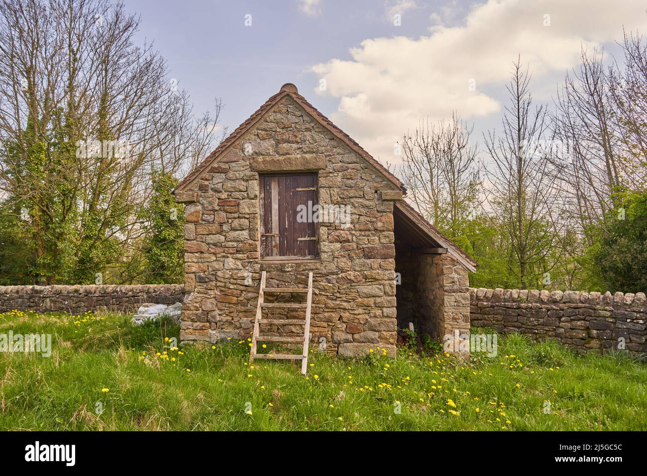 Old stone store house with steps Stock Photo - Alamy