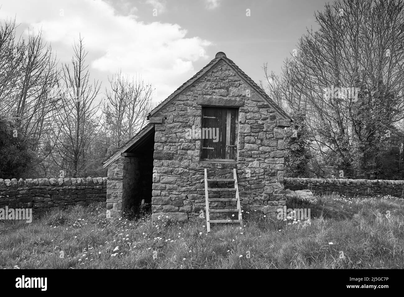 Old stone store house with steps Stock Photo - Alamy