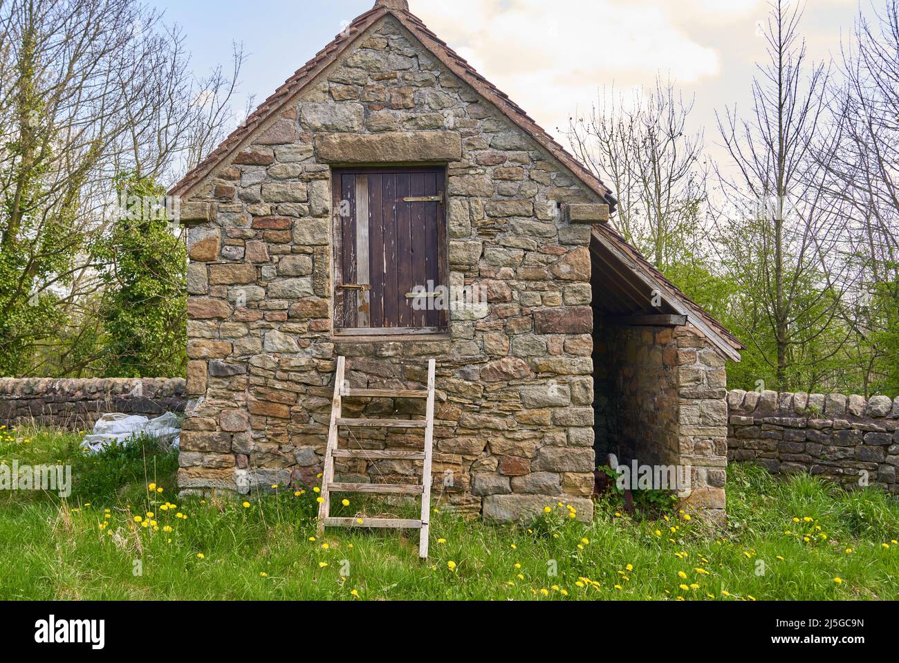 Old stone store house with steps Stock Photo - Alamy