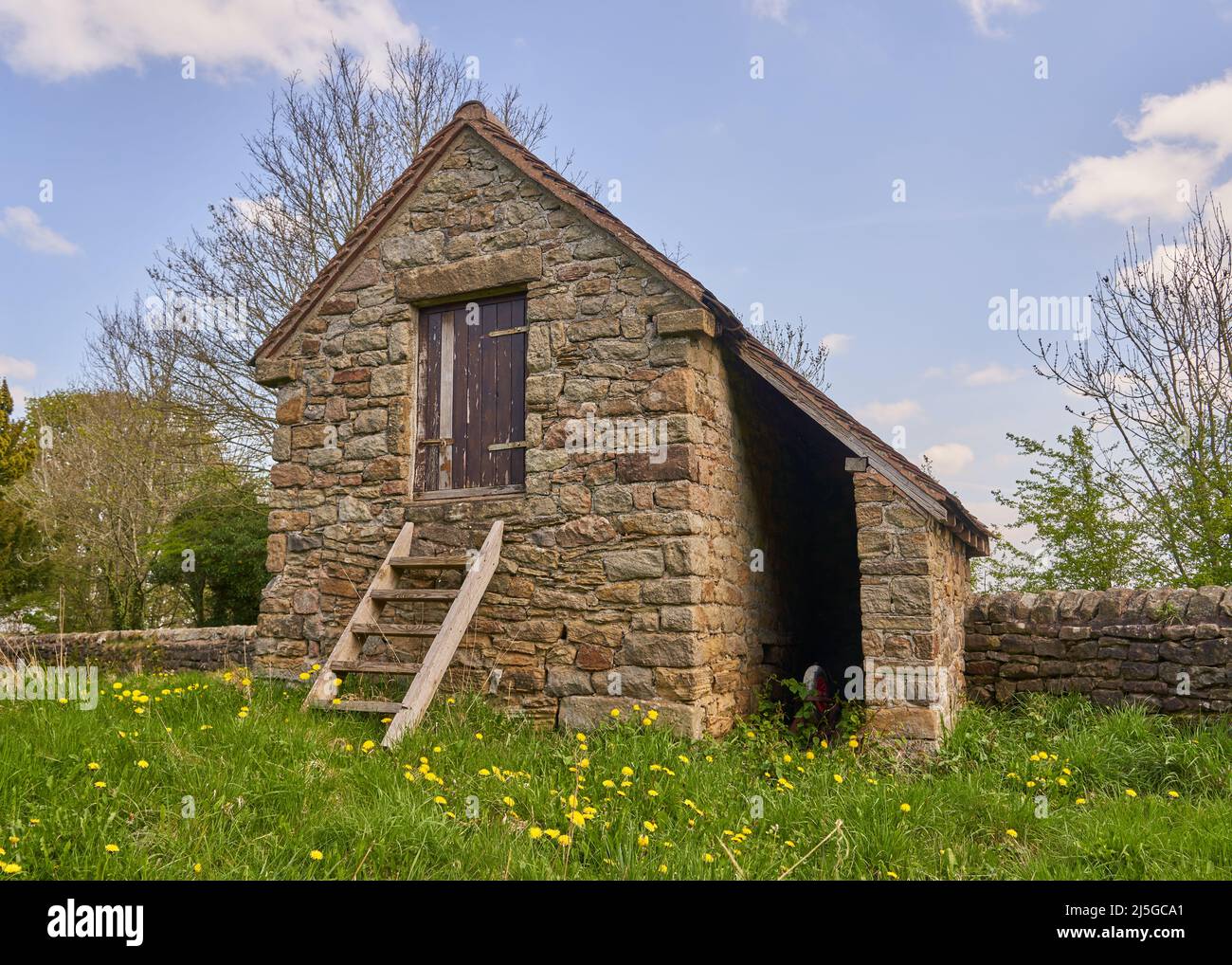 Old stone store house with steps Stock Photo - Alamy