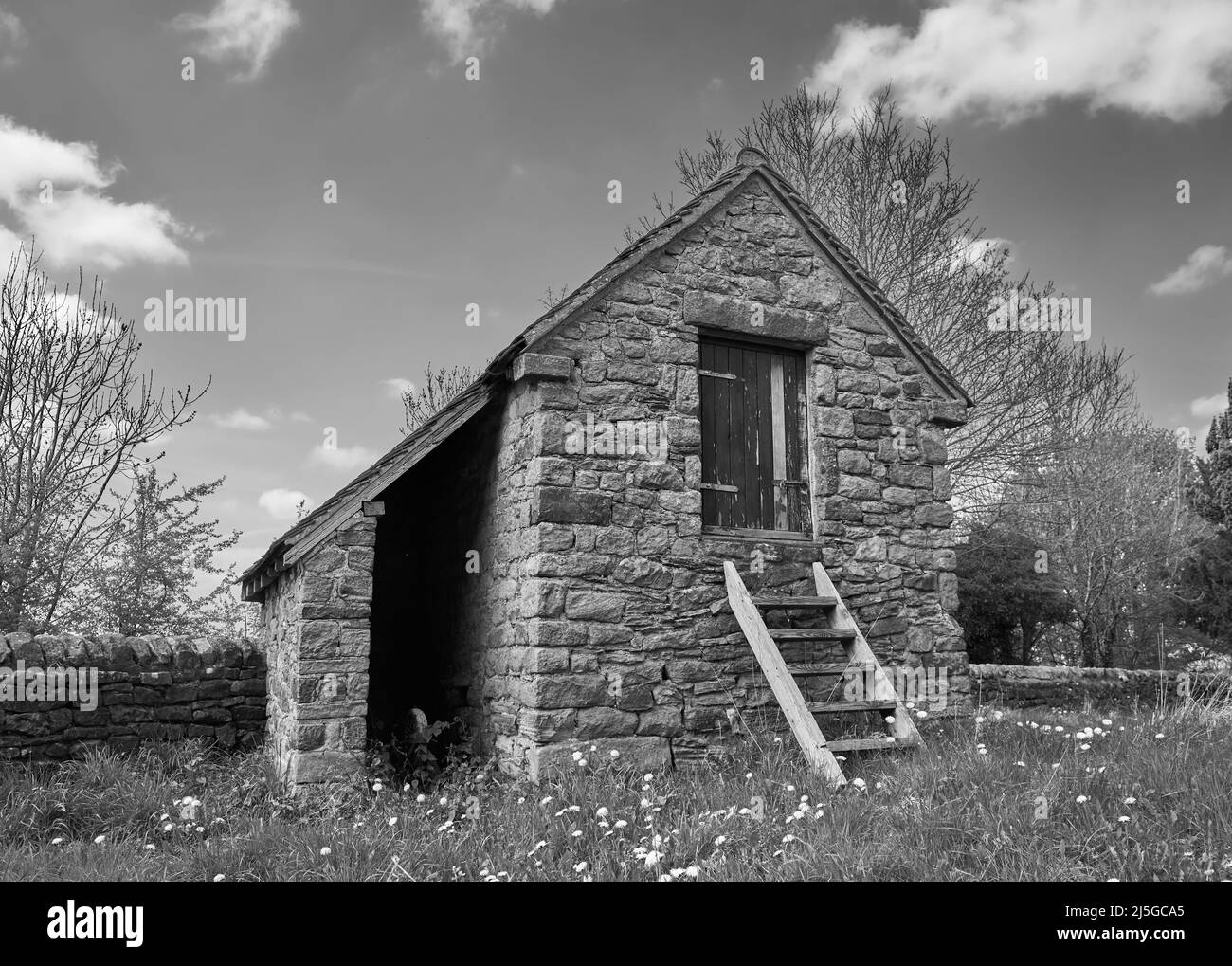 Old stone store house with steps Stock Photo - Alamy