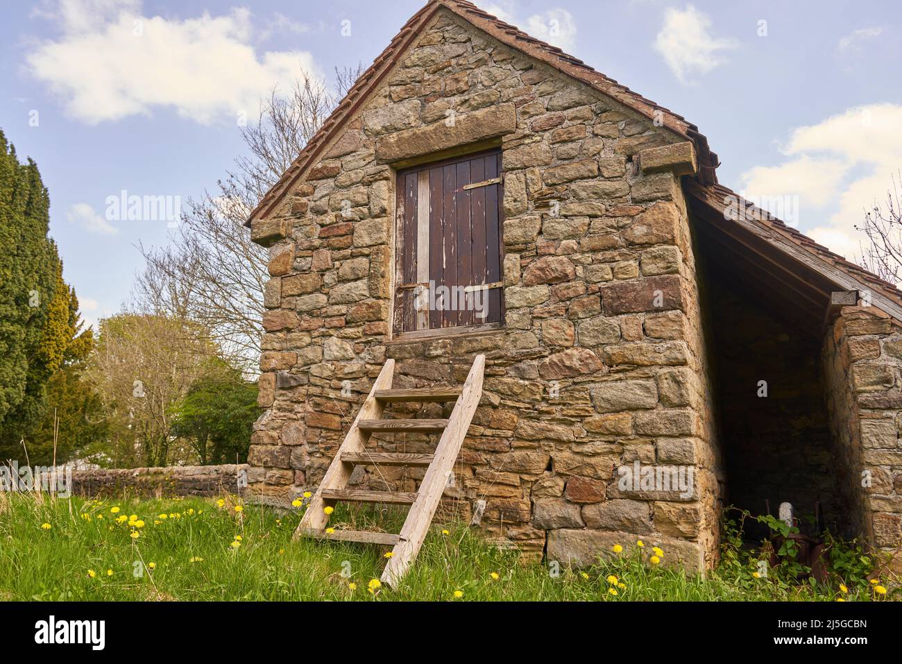 Old stone store house with steps Stock Photo - Alamy
