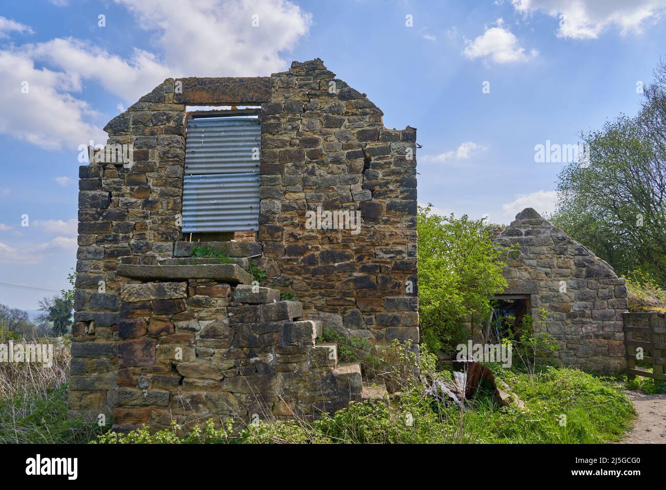 Old stone store house with steps Stock Photo - Alamy