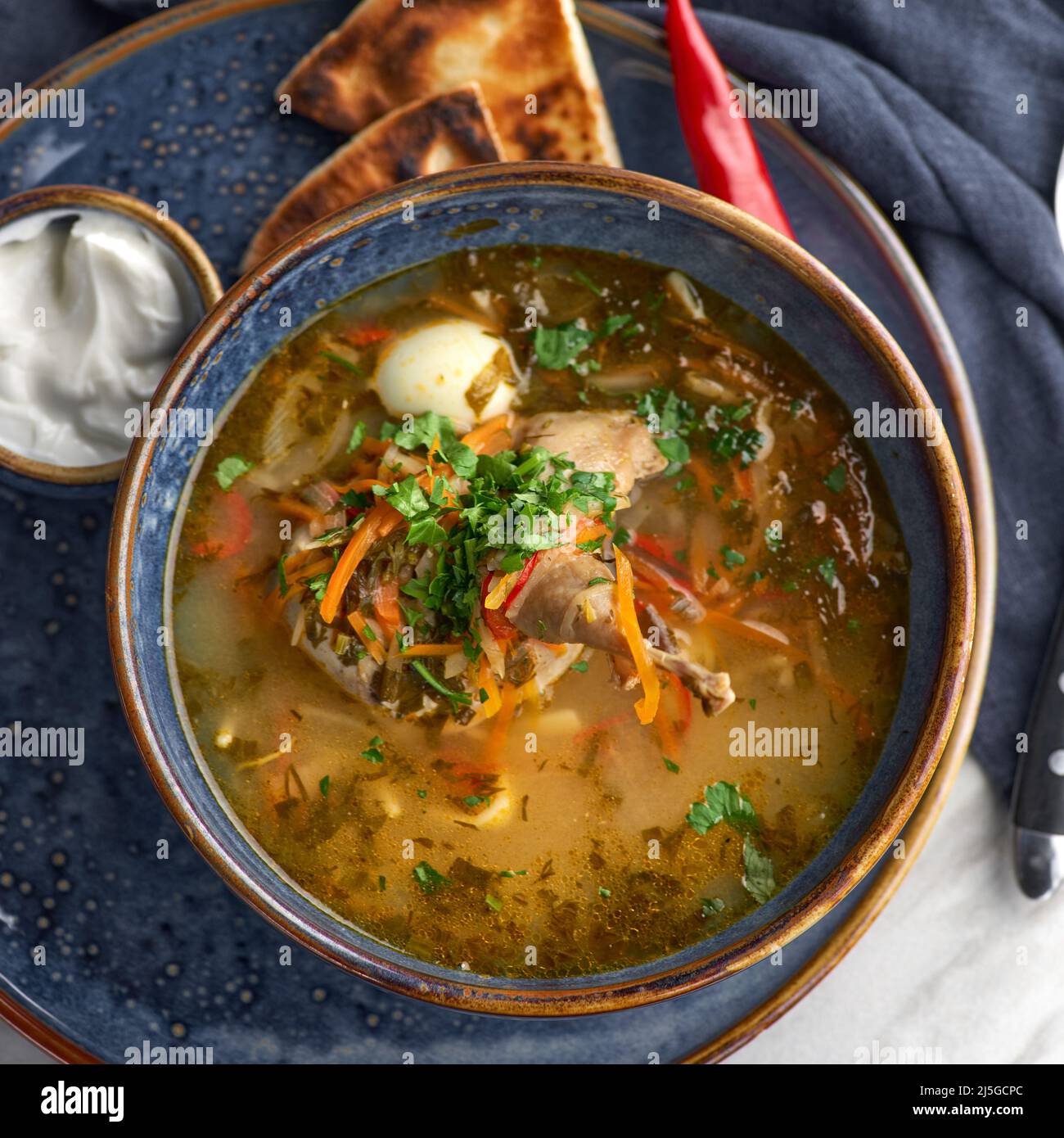 Quail meat soup with vegetables and spices. Restaurant menu. healthy ...