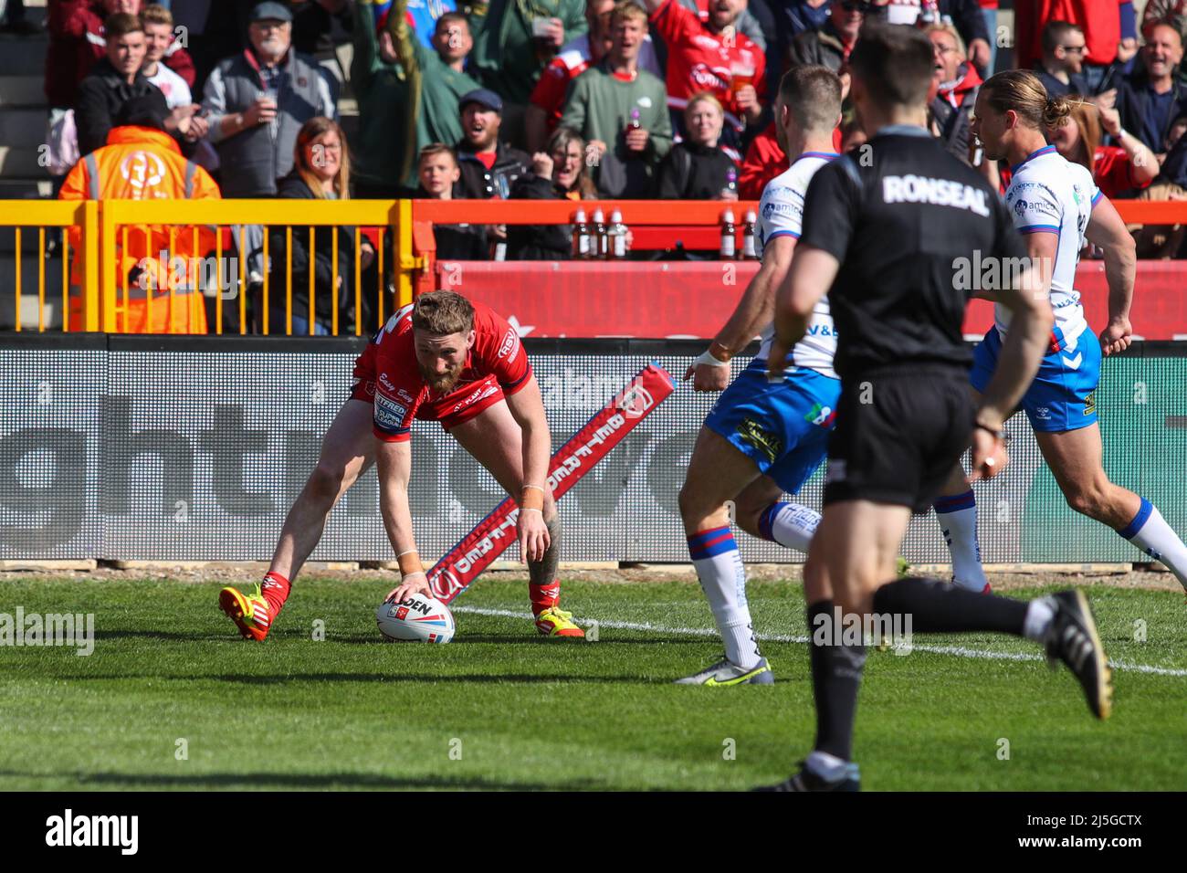 Ethan Ryan #23 of Hull KR goes over for his first try of the match ...