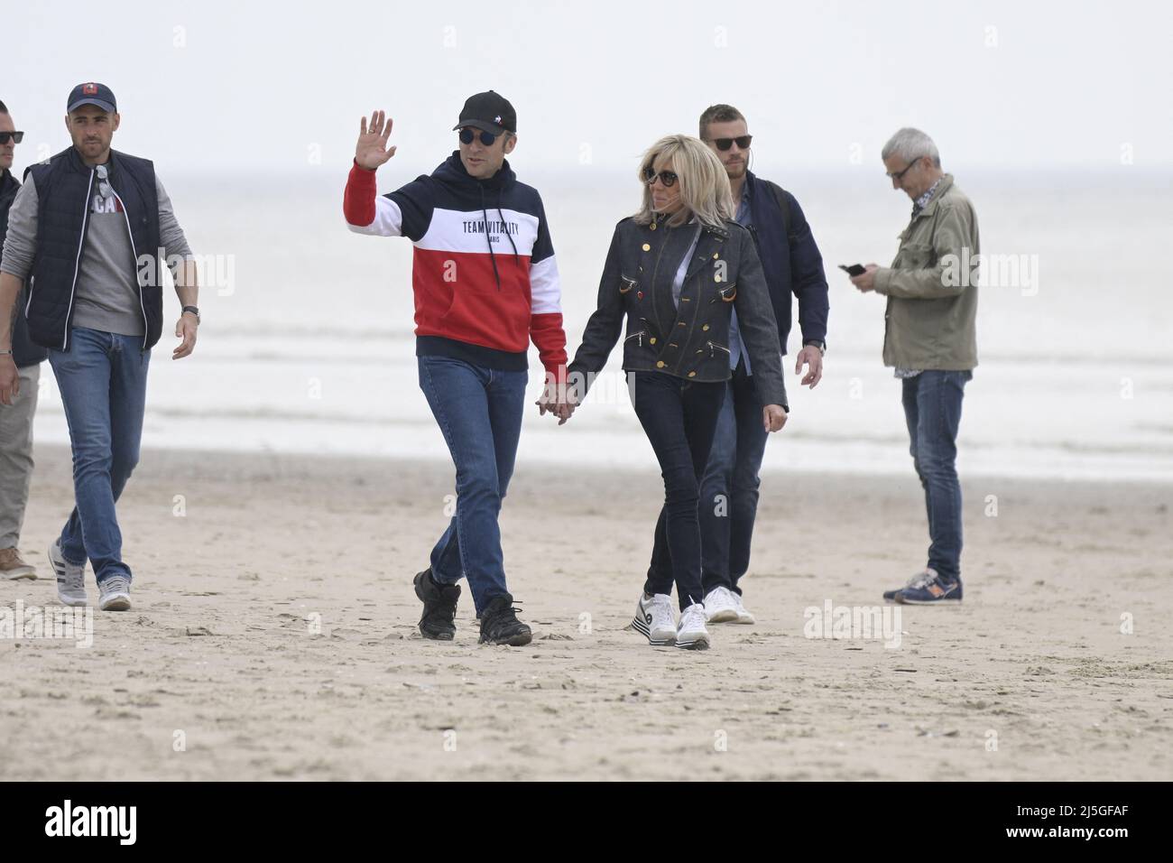 French President Emmanuel Macron and wife Brigitte Macron walking on ...