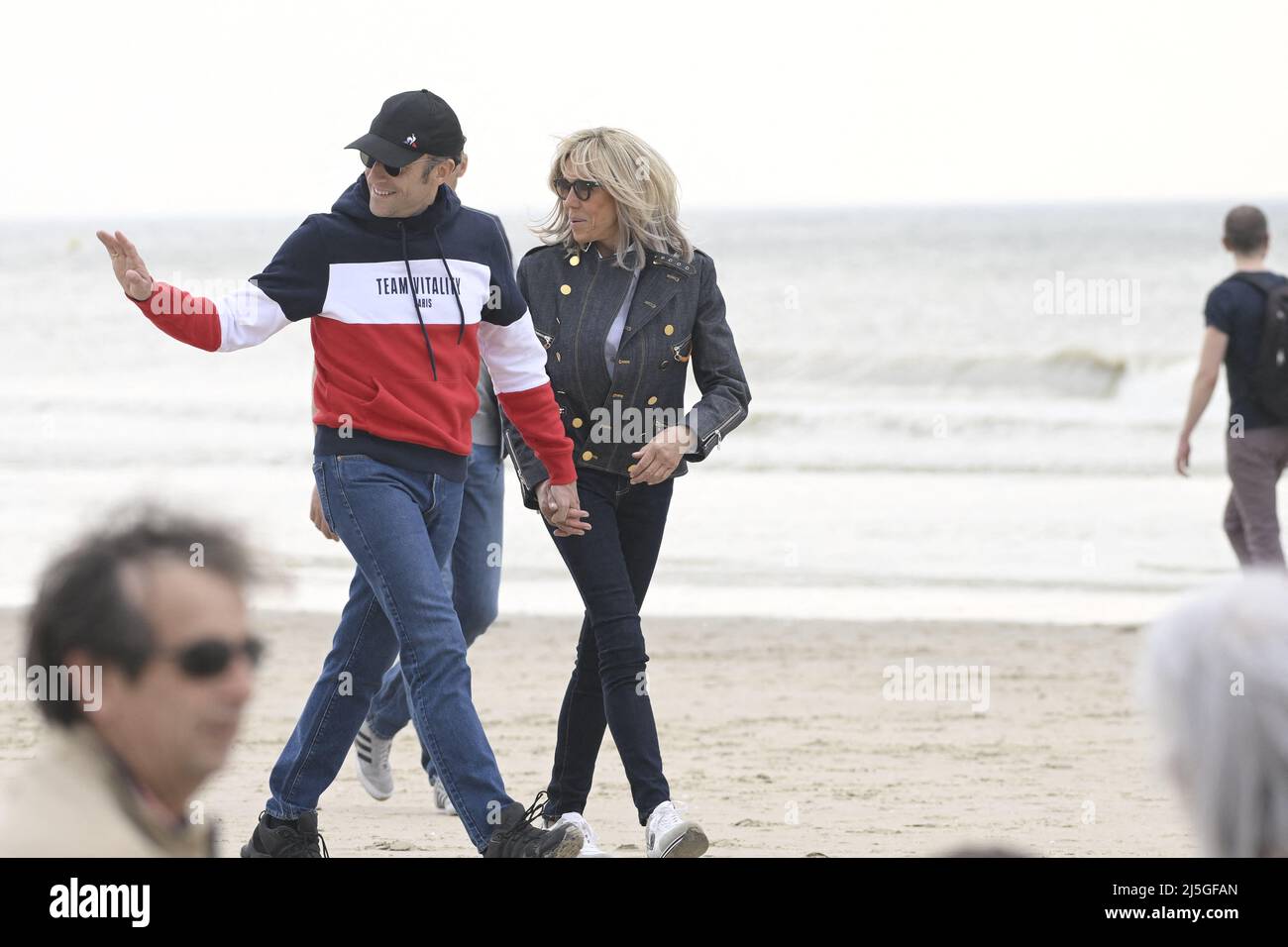 French President Emmanuel Macron and wife Brigitte Macron walking on ...
