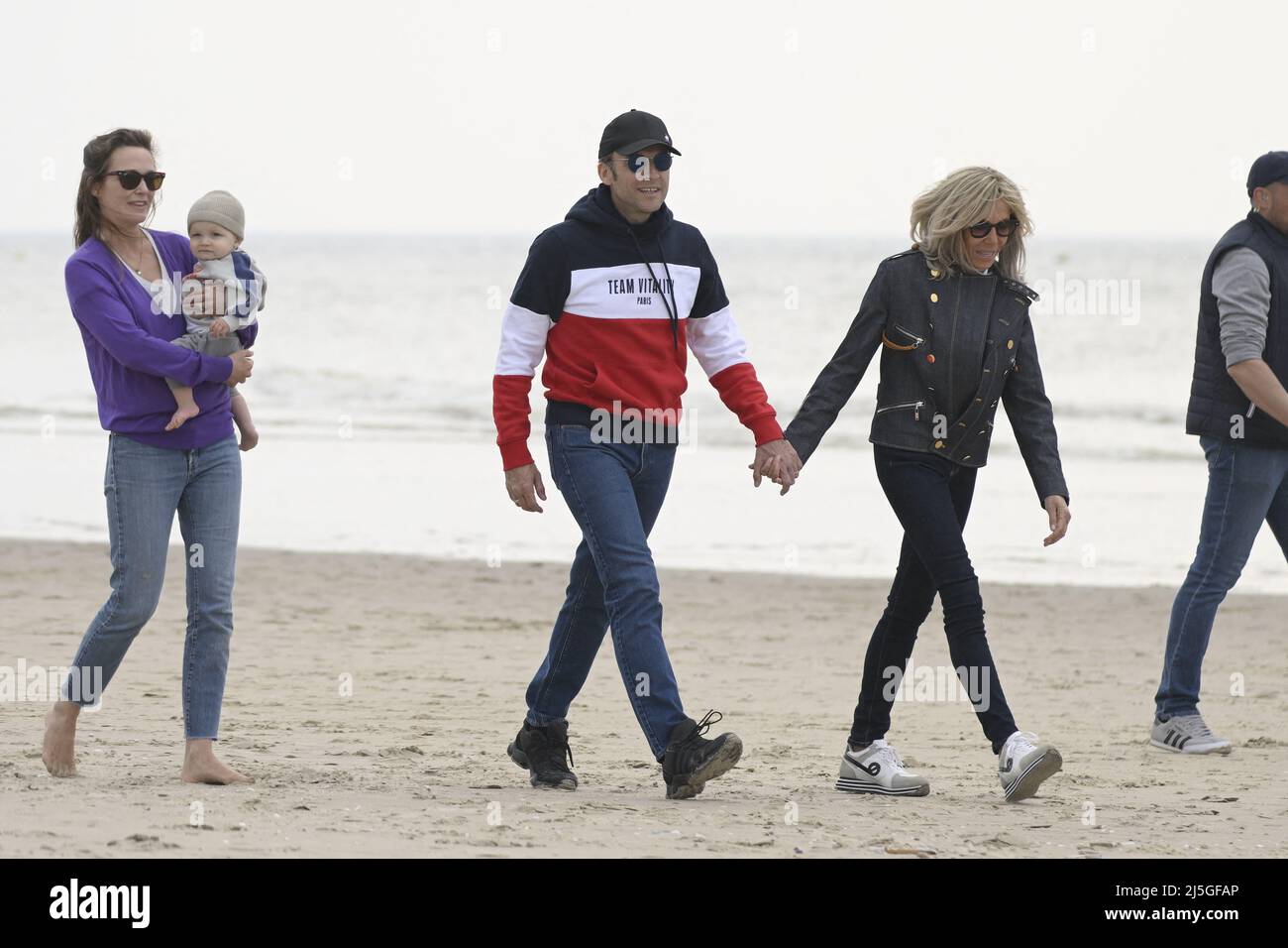 French President Emmanuel Macron and wife Brigitte Macron walking on ...