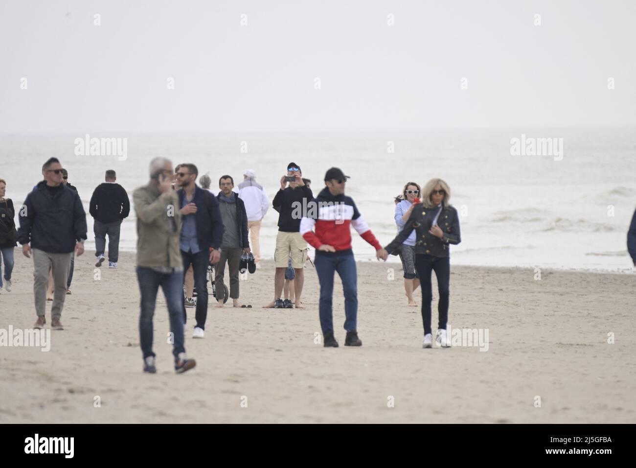 French President Emmanuel Macron and wife Brigitte Macron walking on ...