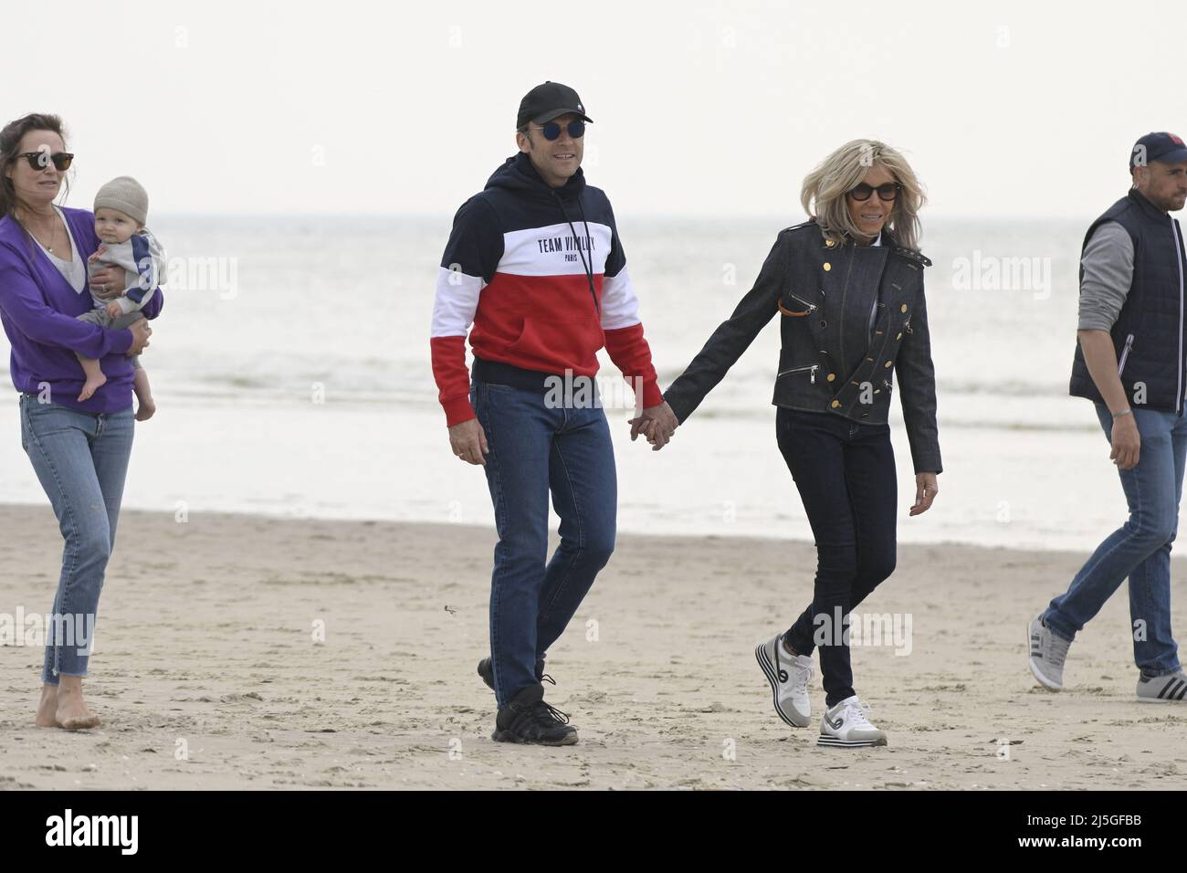 French President Emmanuel Macron and wife Brigitte Macron walking on ...