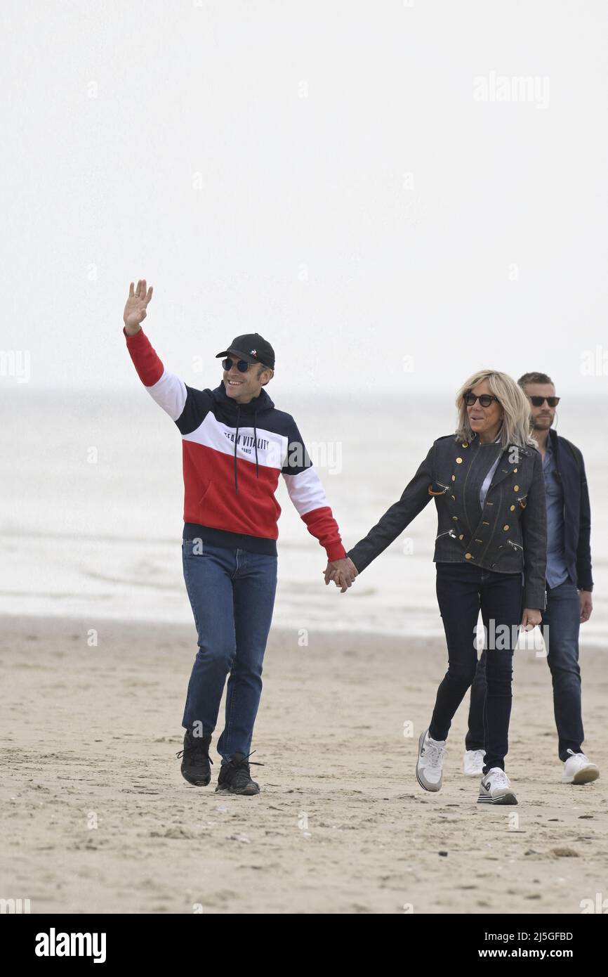 French President Emmanuel Macron and wife Brigitte Macron walking on ...