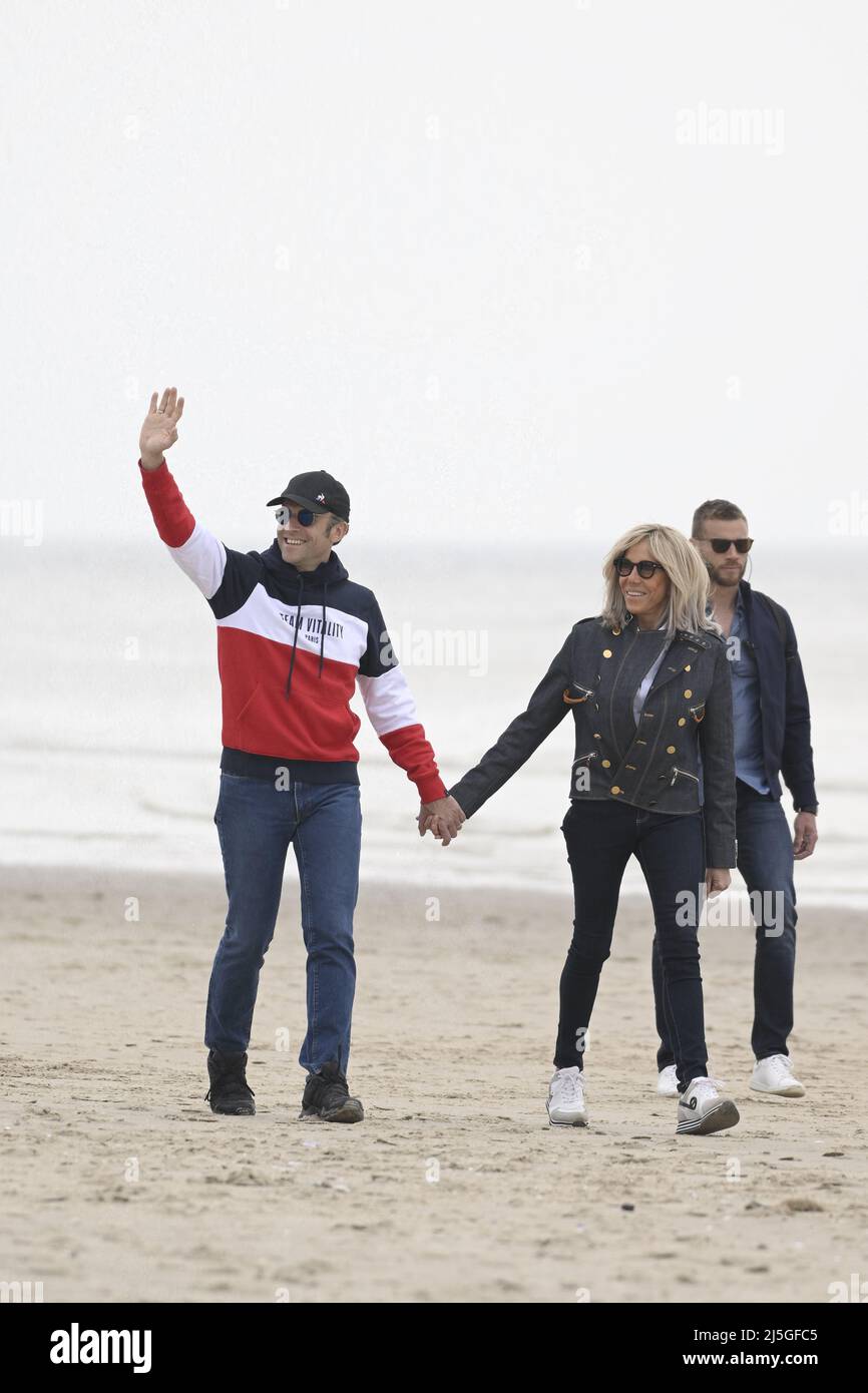 French President Emmanuel Macron and wife Brigitte Macron walking on ...