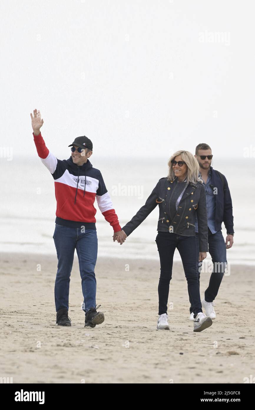 French President Emmanuel Macron and wife Brigitte Macron walking on ...