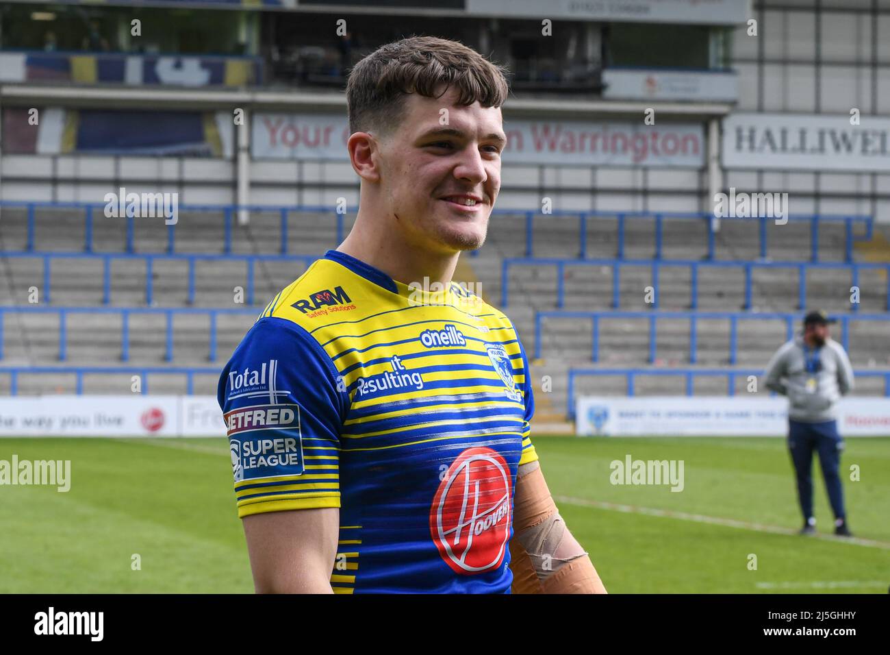 Josh Thewlis #22 of Warrington Wolves speaks to the media after he ...