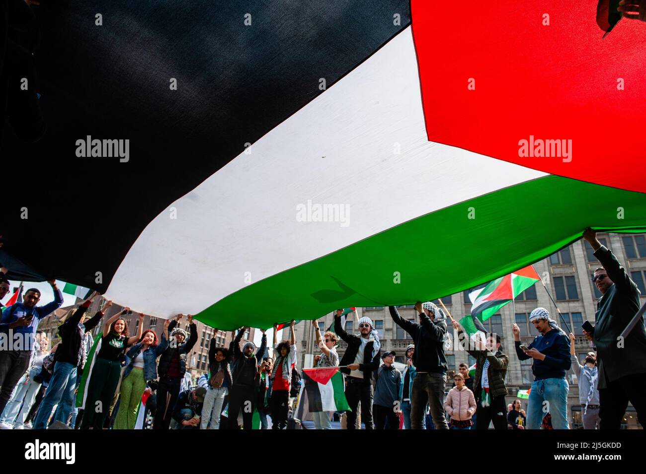 A view from below of a huge Palestinian flag during the demonstration ...