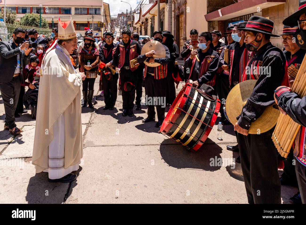 A Catholic Priest Blesses A Musical Band After An Outdoor Mass In The ...