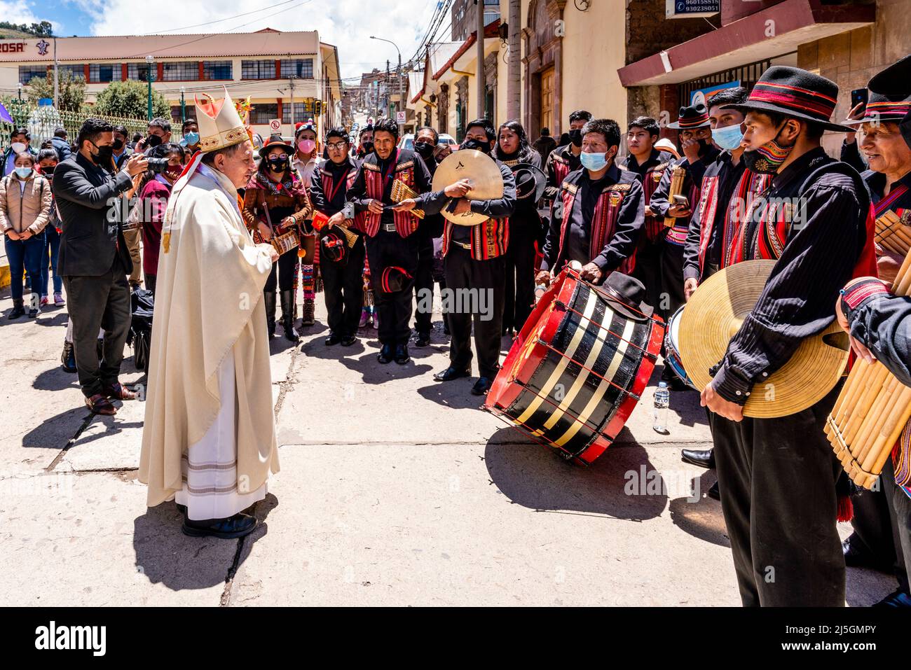 A Catholic Priest Blesses A Musical Band After An Outdoor Mass In The ...