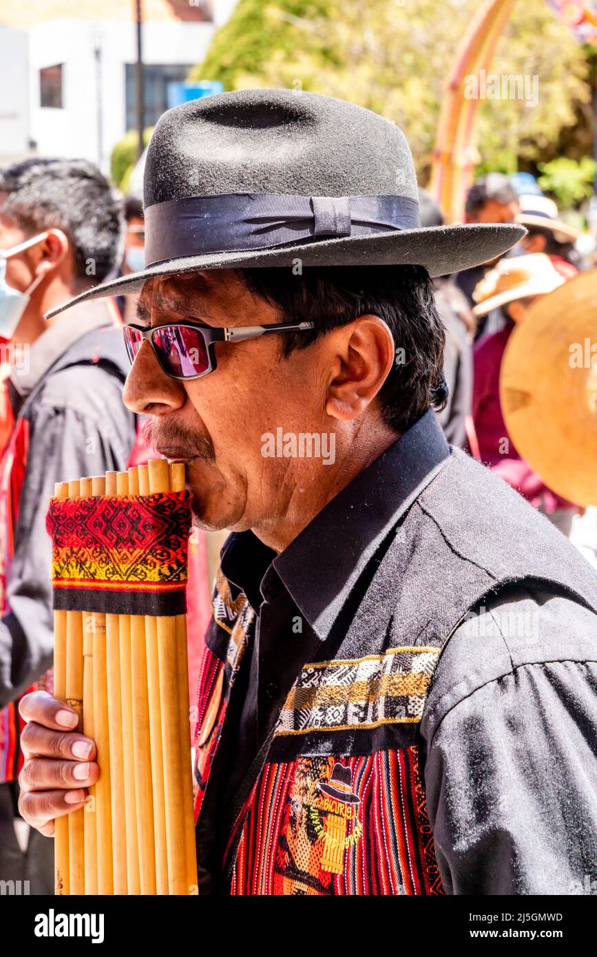 Musicians Parade Through The Streets Playing Pan Pipes During A ...