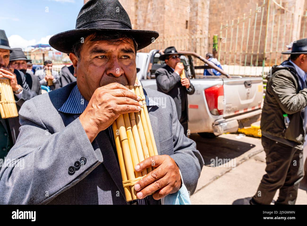 Musicians Parade Through The Streets Playing Pan Pipes During A ...