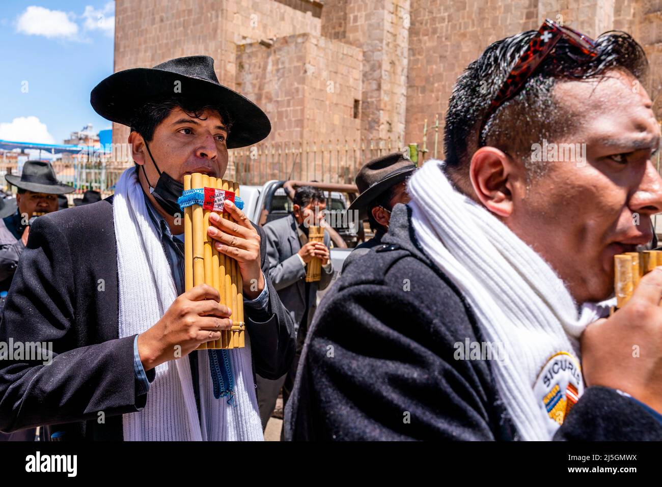 Musicians Parade Through The Streets Playing Pan Pipes During A ...