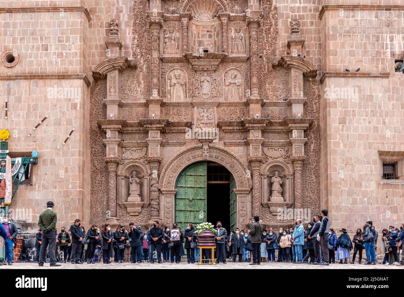 Local People Attend A Funeral At The Puno Cathedral In Plaza De Armas ...