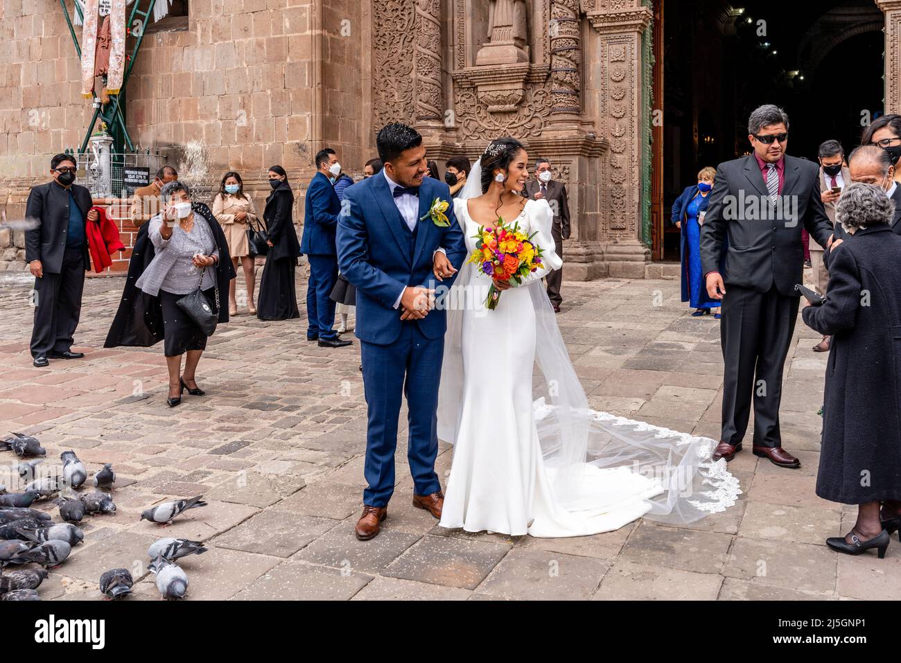 A Young Peruvian Couple Leave The Cathedral After Getting Married, The ...